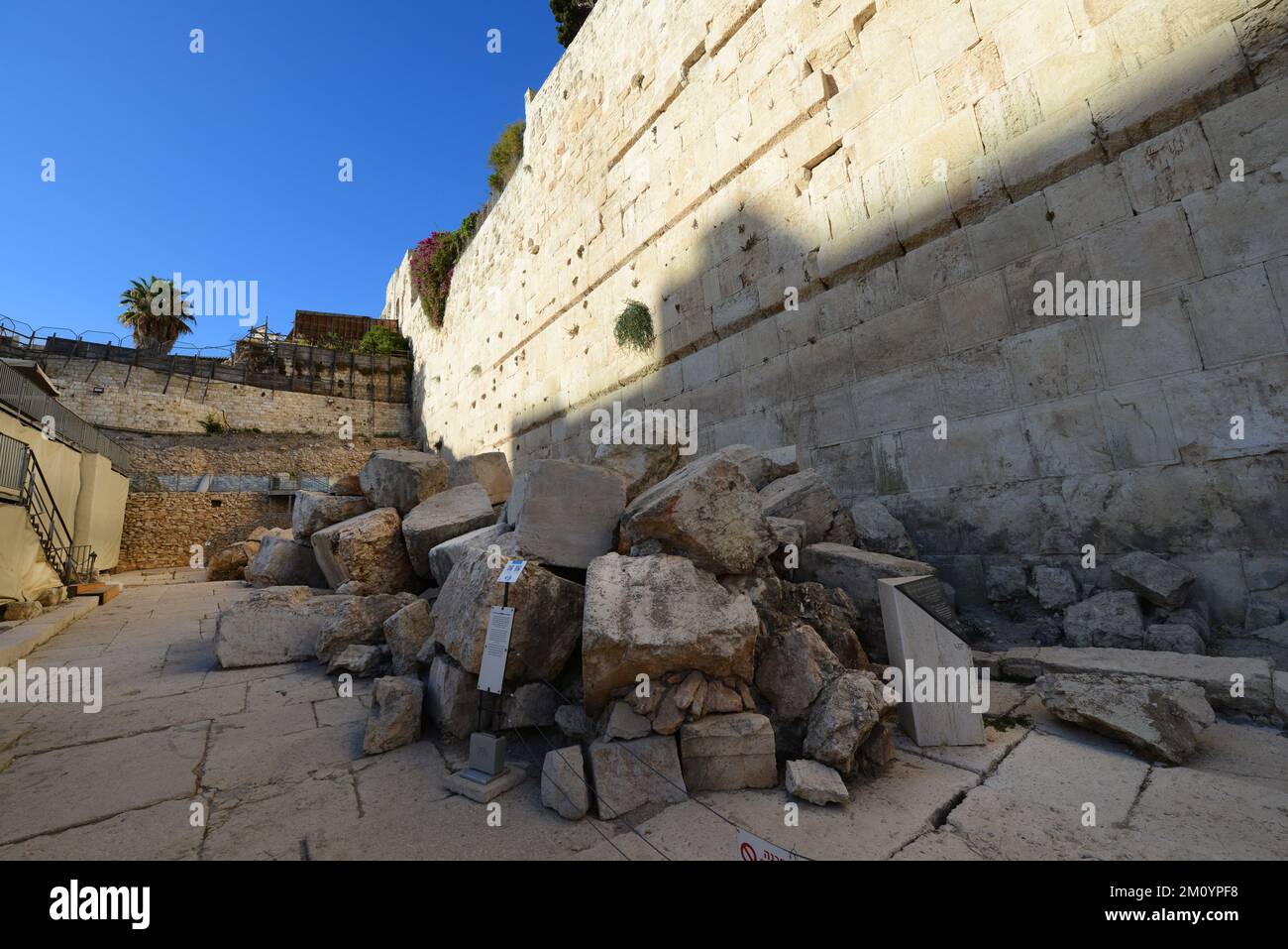 Remains of Robinson's Arch above the Herodian street. The archeological ...