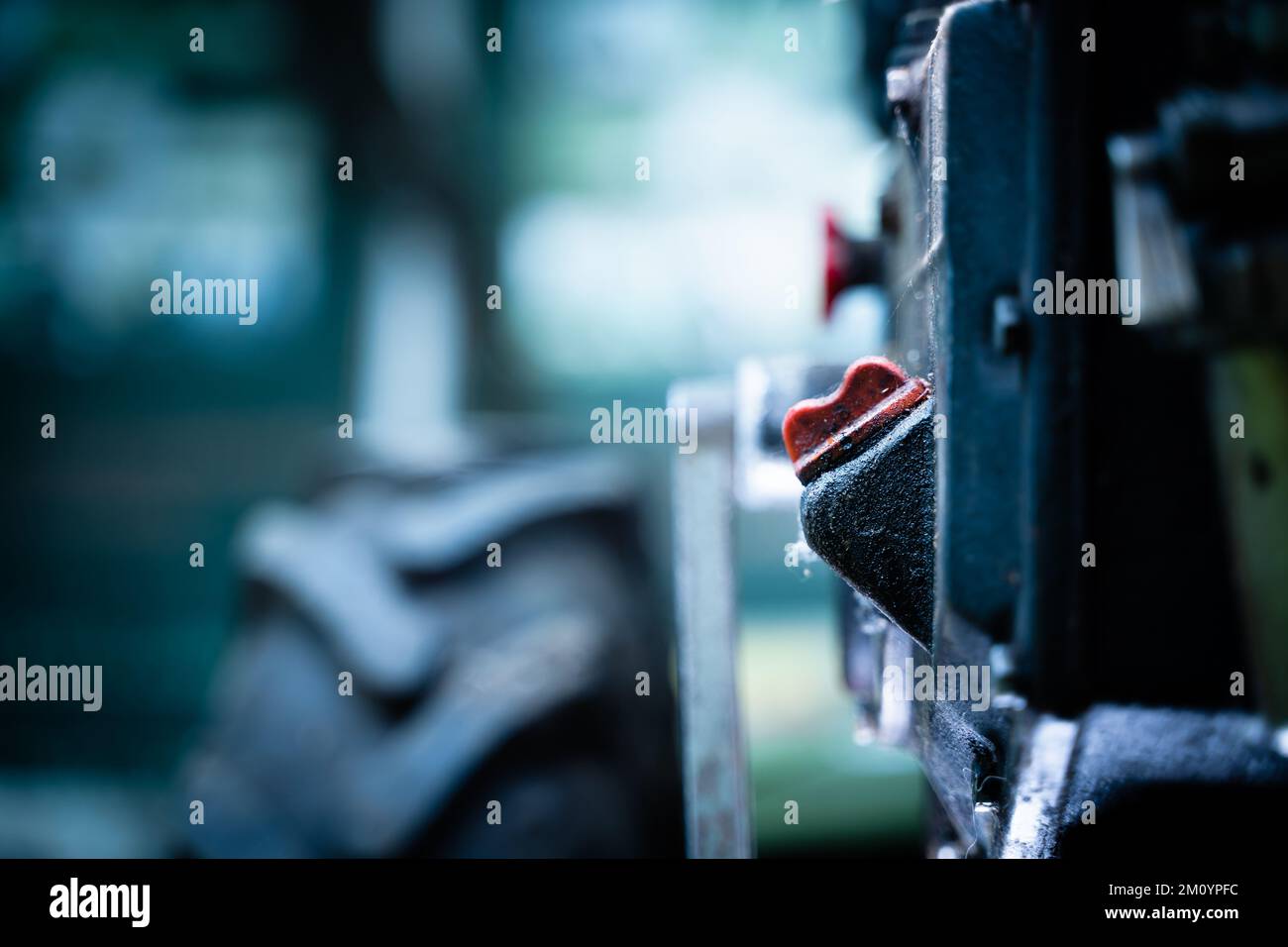 Filler hole for filling oil and dipstick for checking the oil level ...