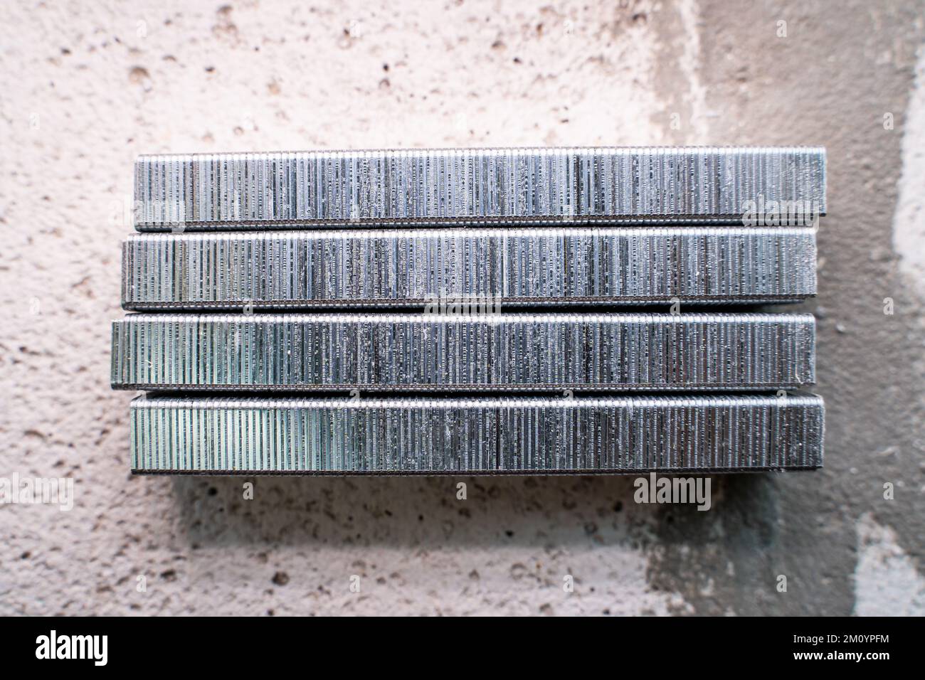 Staples for a stapler construction hardened galvanized close-up on ...