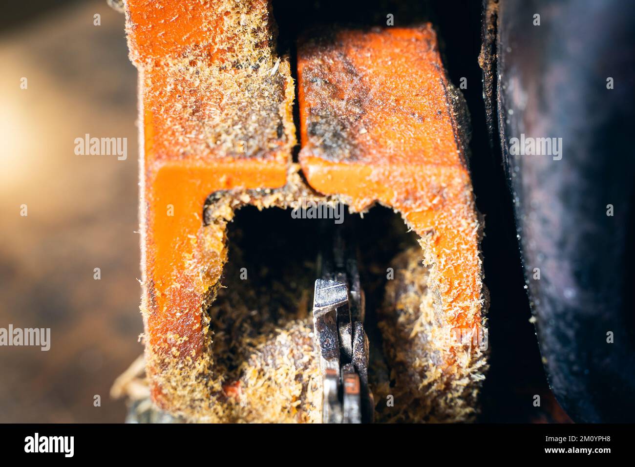 Chainsaw chain on the tire close-up. Saw teeth for cutting wood on a ...