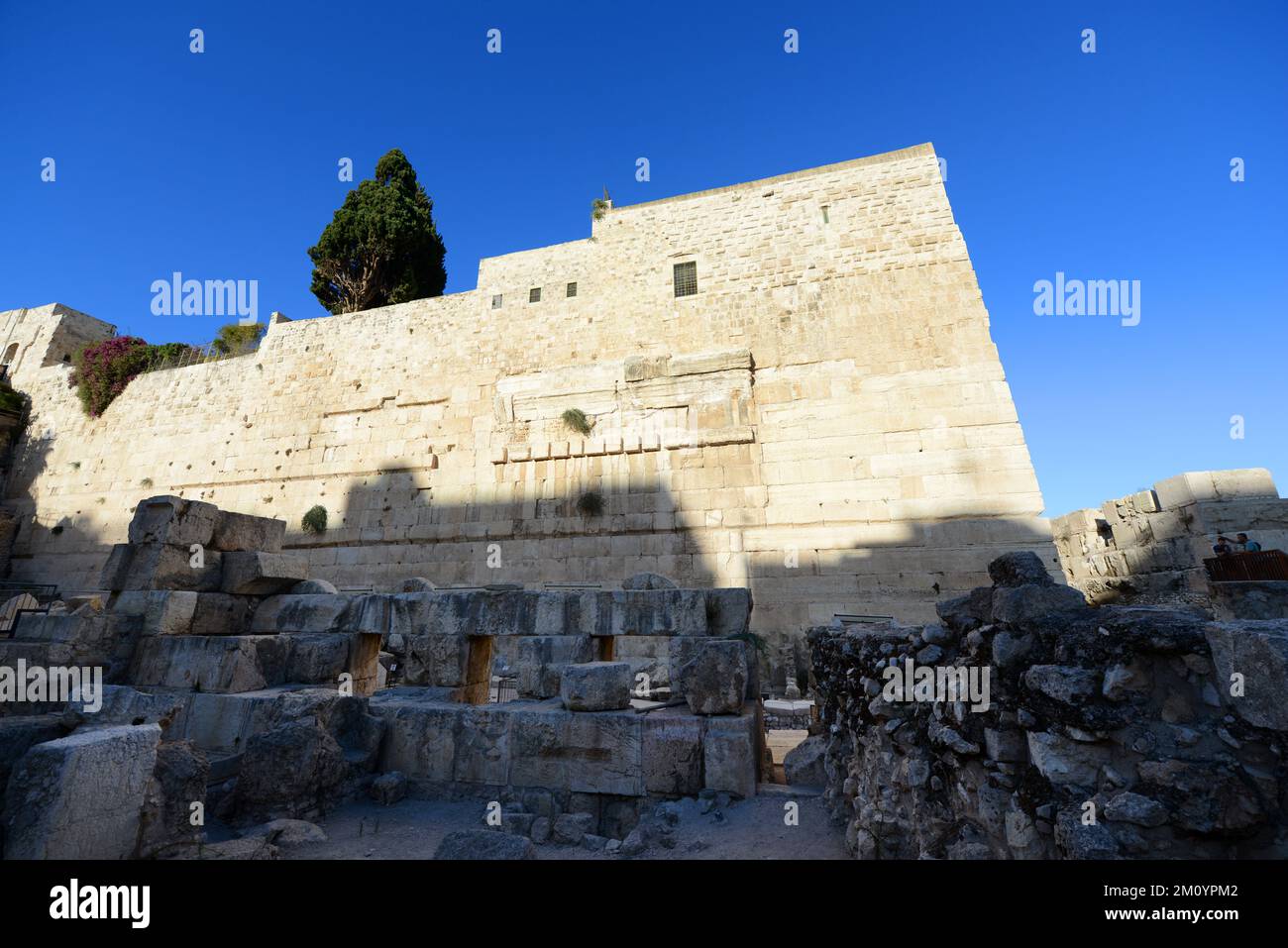 Remains of Robinson's Arch above the Herodian street. The archeological ...