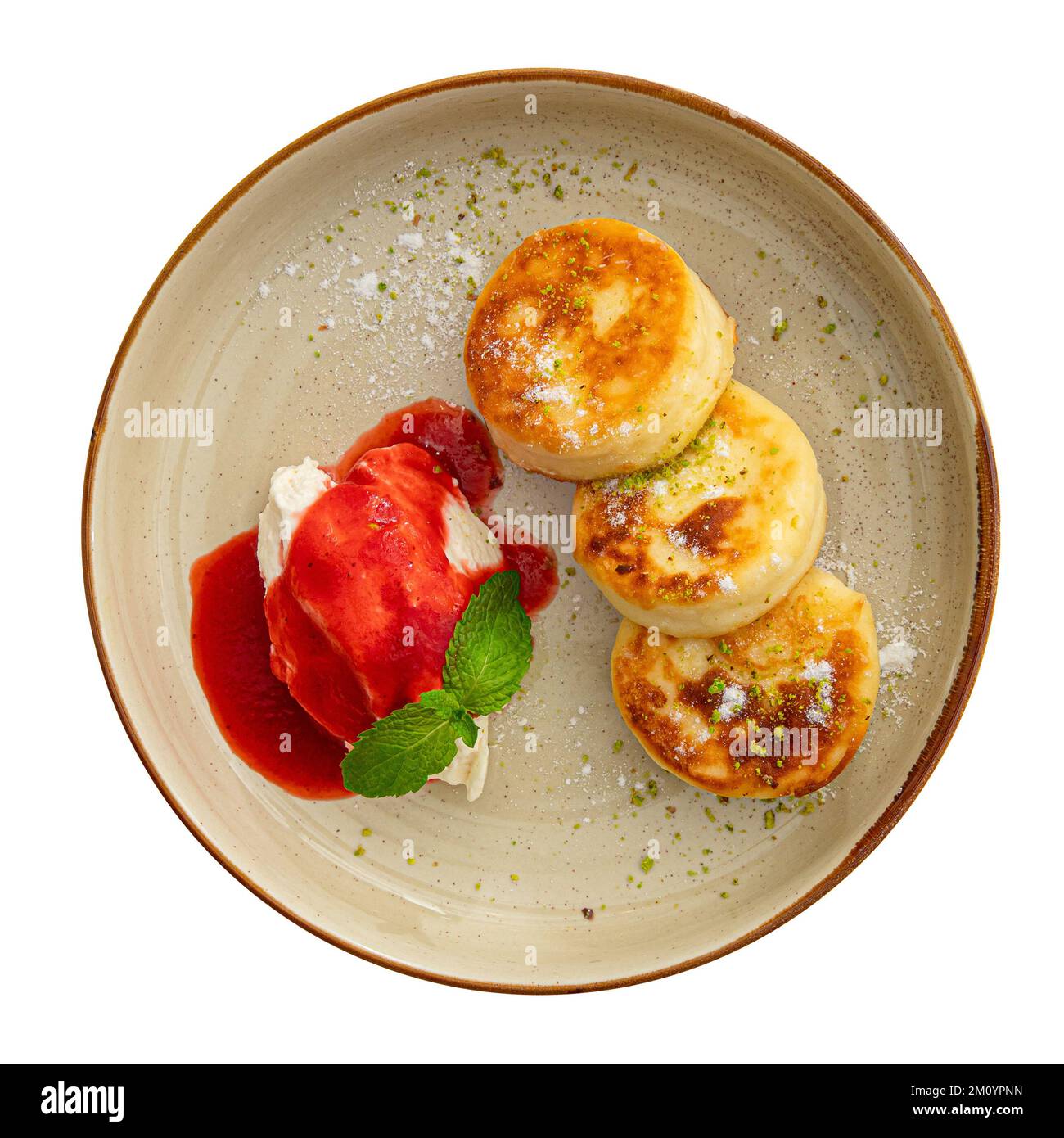 Russian cottage cheese syrniki pancakes with jam Stock Photo - Alamy