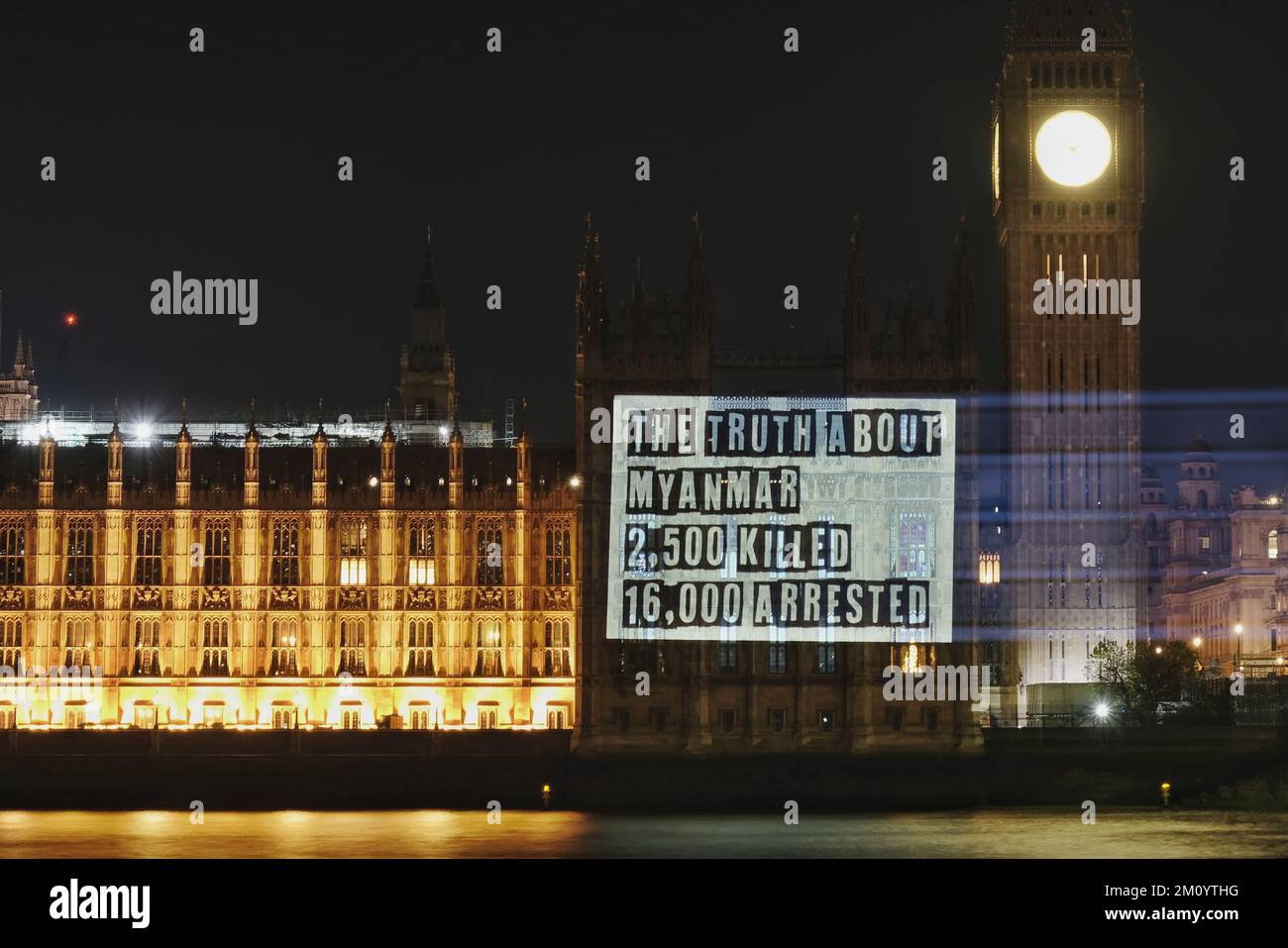 London, UK. 8th December, 2022. Campaigners projected images onto the ...