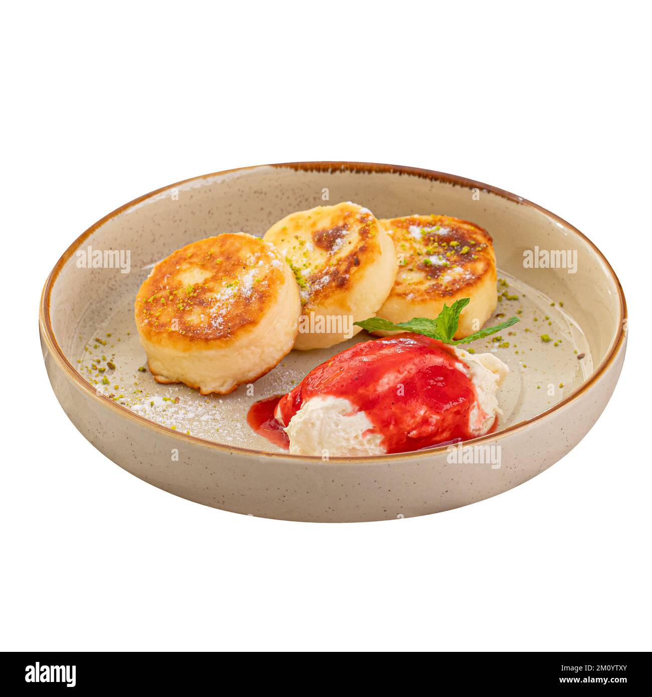 Russian cottage cheese syrniki pancakes with jam Stock Photo - Alamy