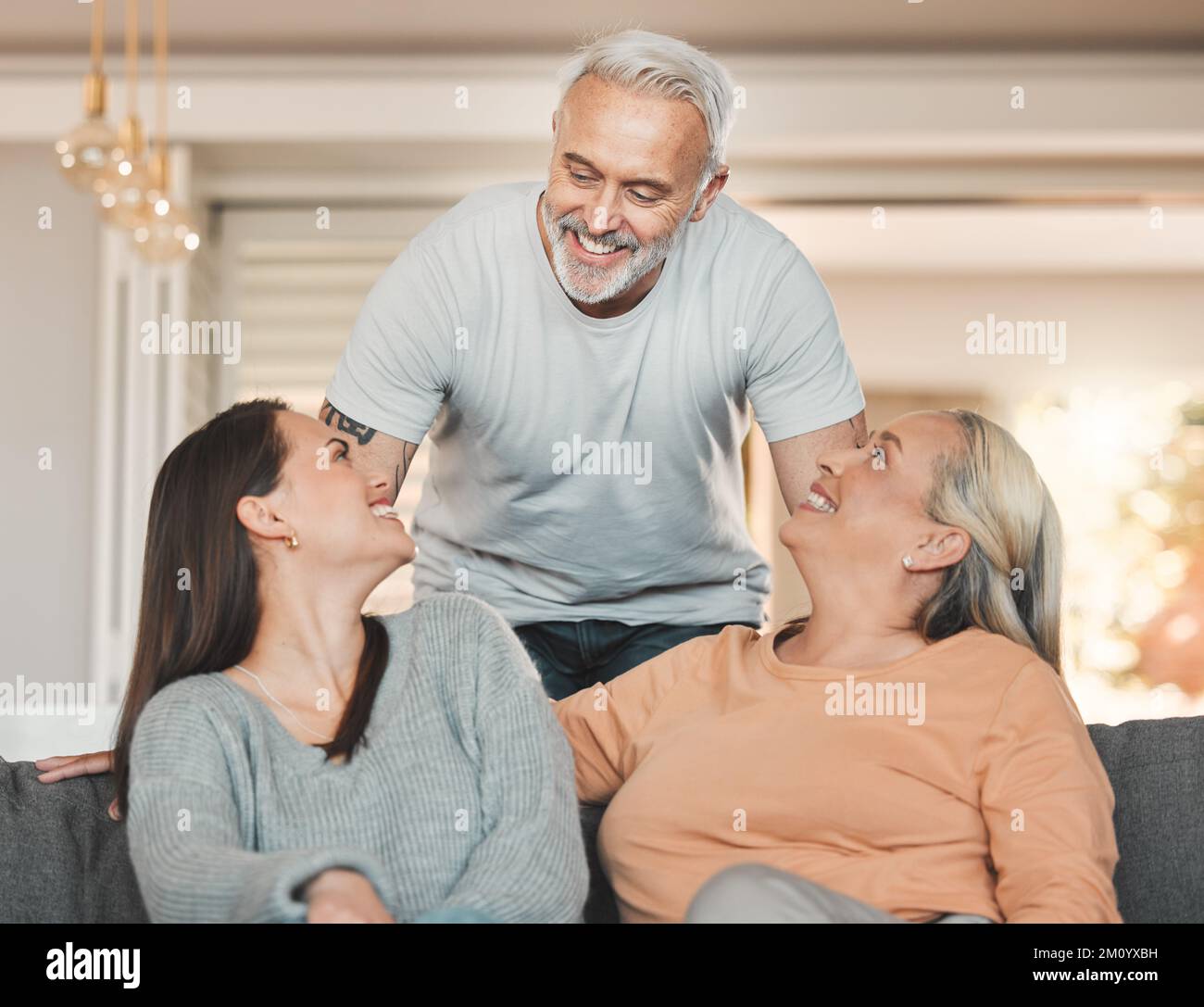 Our most basic instinct is for family. a woman sitting on a couch with ...