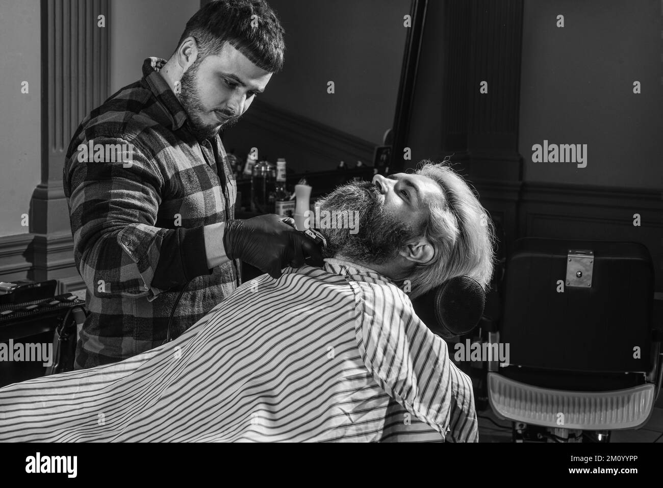 Barber is essential resource for your style. Shaving with razor. Facial ...