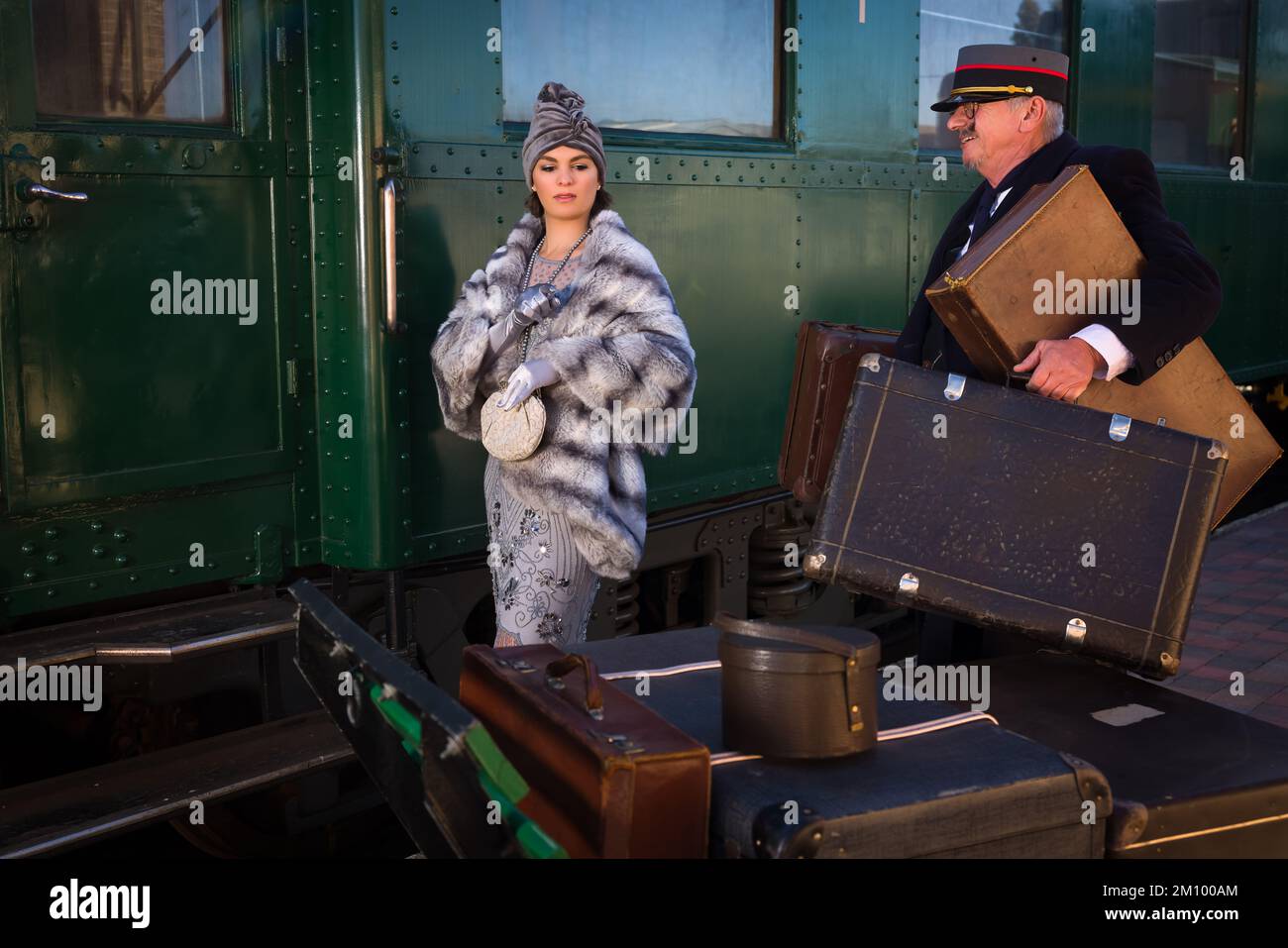 Reenactment scene on the platform near an authentic 1927 first class ...