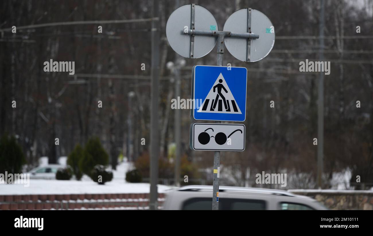 Riga, Latvia, November 23, 2022: Pedestrian crossing for people with ...