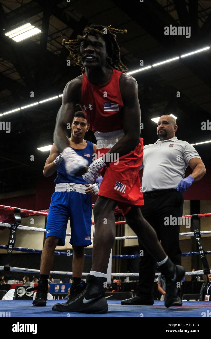 Lubbock, TX, USA. 8th Dec, 2022. Tyshawn Denson (red) of Akron, OH ...