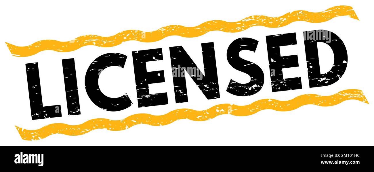 LICENSED text written on yellow-black lines stamp sign Stock Photo - Alamy