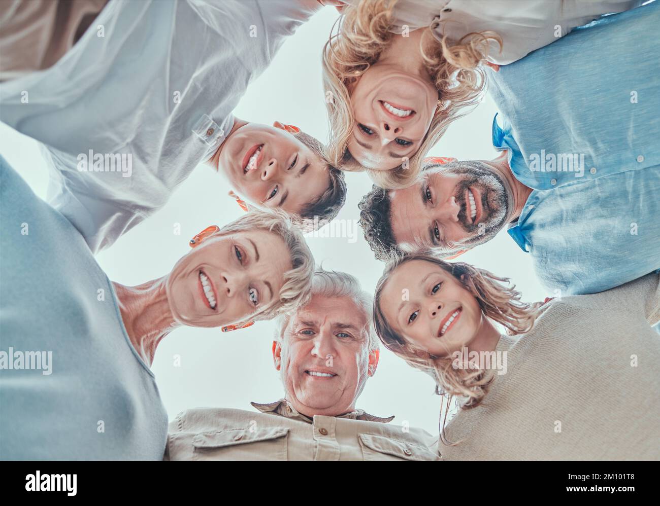 Just a family looking at a beautiful person. a family huddling together ...