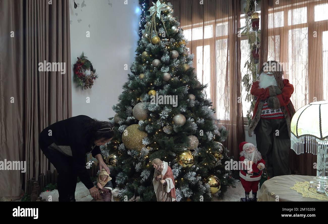 BEIT SAHOUR, ISRAEL - DECEMBER 8: A member of Palestinian Christian ...