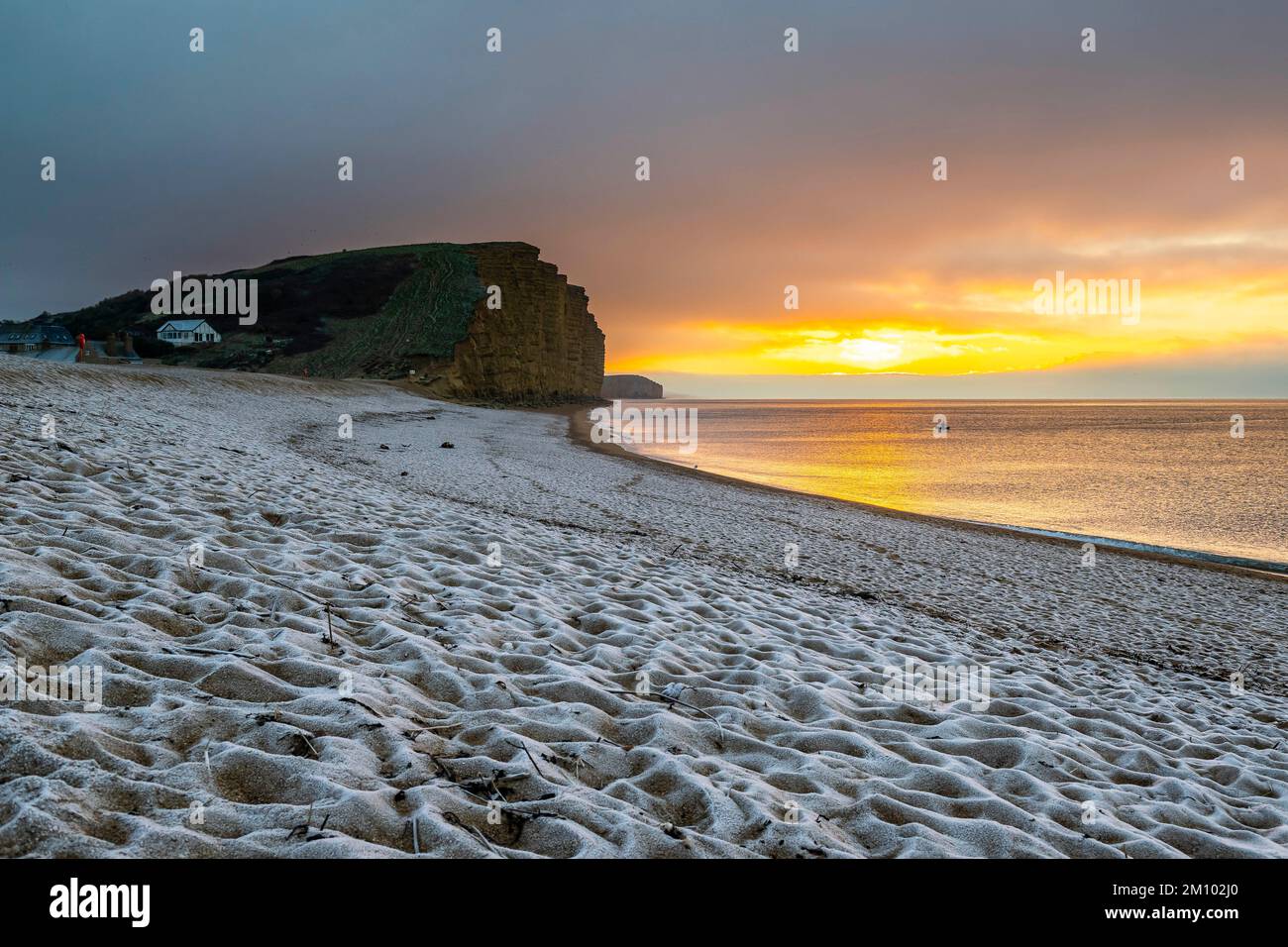West Bay, Dorset, UK. 9th December 2022. UK Weather. The beach is in a ...
