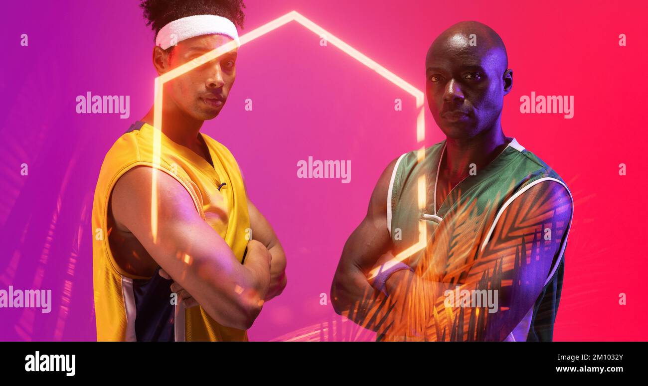 Serious african american basketball players with arms crossed by ...