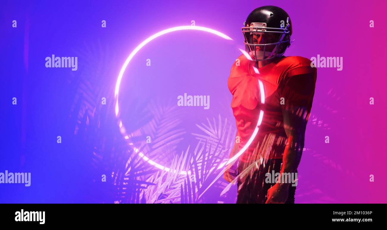 American football player wearing red uniform and helmet standing by ...