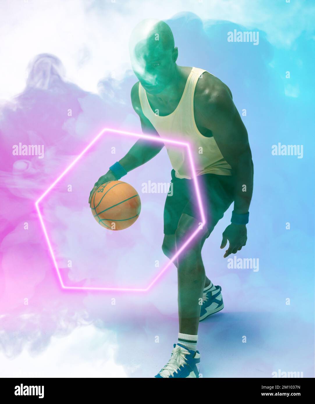 African american male player dribbling basketball by illuminated ...