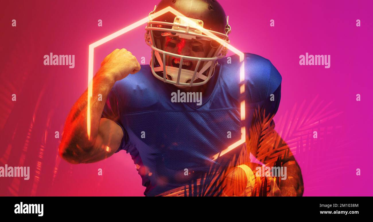 Cheerful american football player gesturing while standing by ...