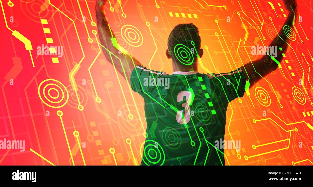 Composite of caucasian soccer player and computer circuit over red ...