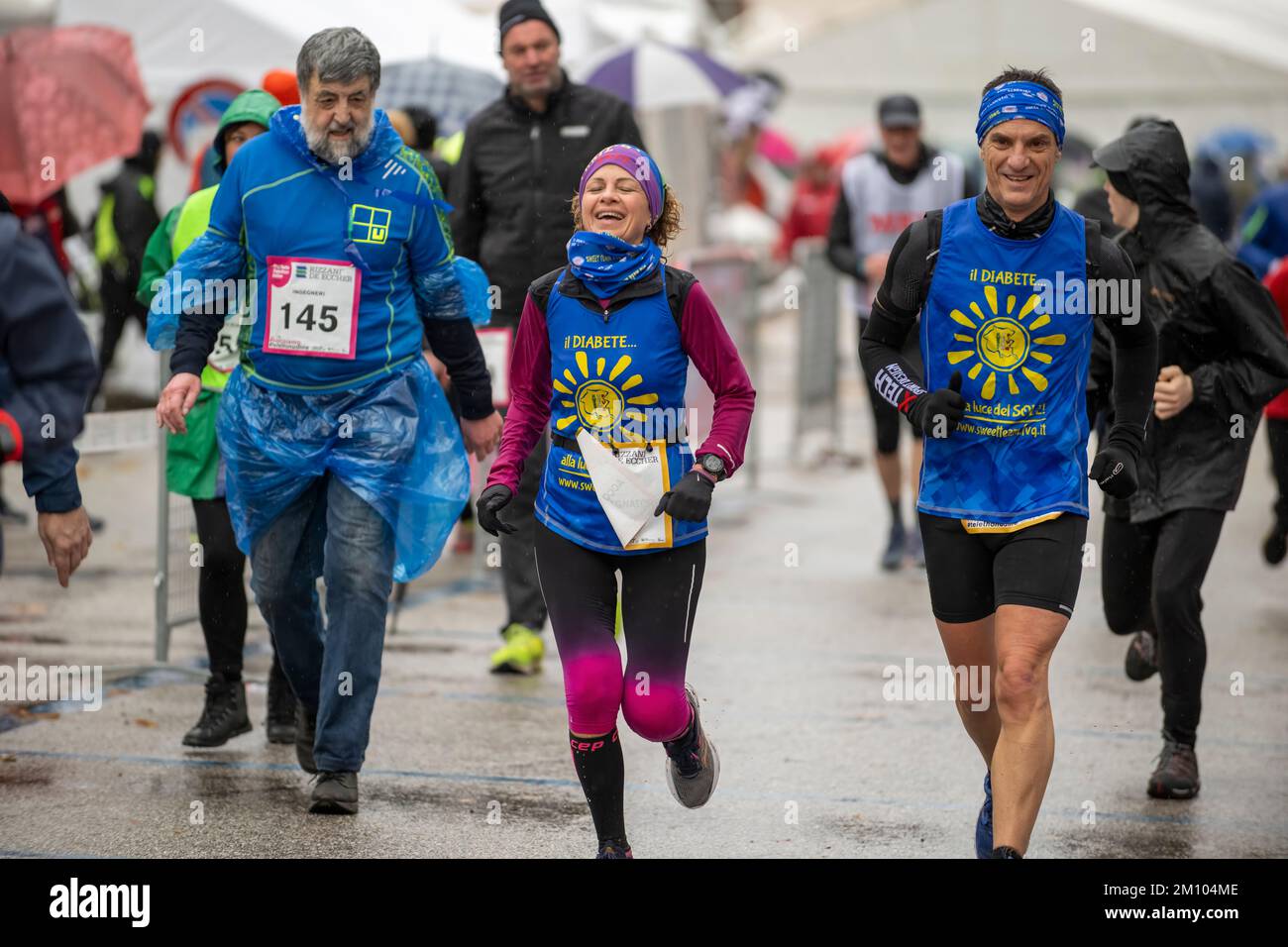 Athletes running under the rain in occasion of the Telethon marathon ...