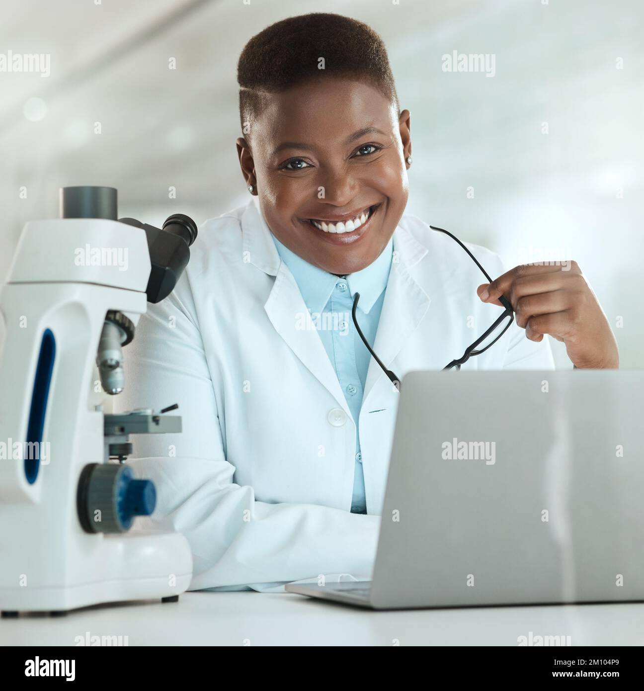 Young happy african woman scientist hi-res stock photography and images ...