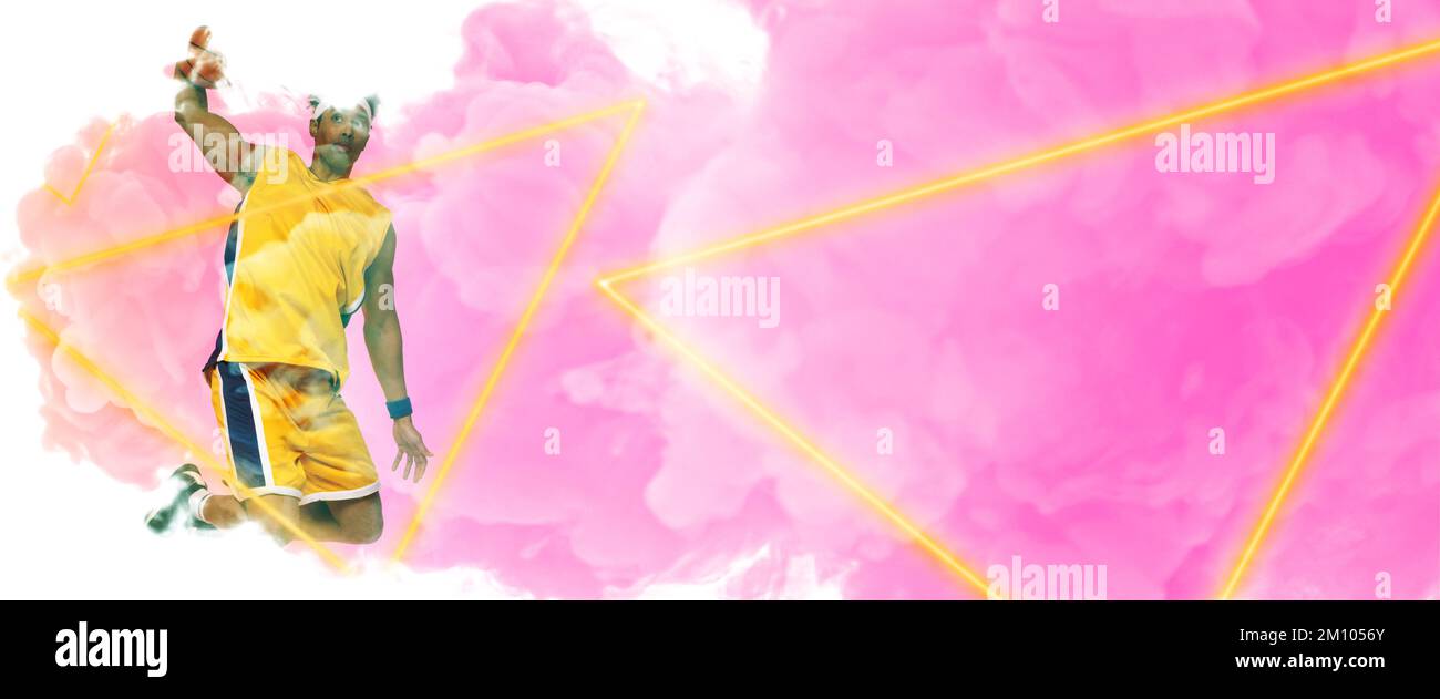 Composite of biracial basketball player jumping by illuminated ...
