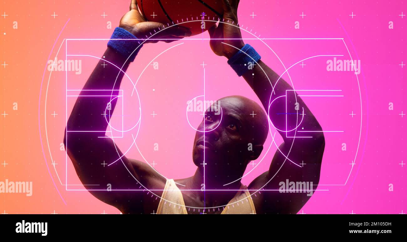 Bald african american basketball player with arms raised throwing ball ...
