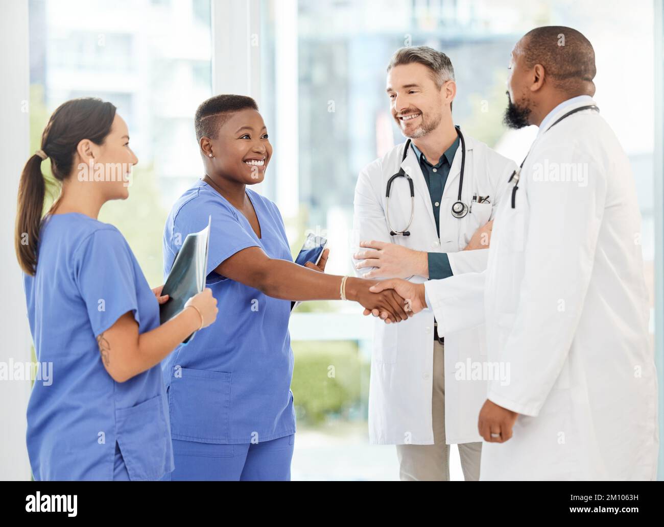 Diverse medical group standing in hi-res stock photography and images ...