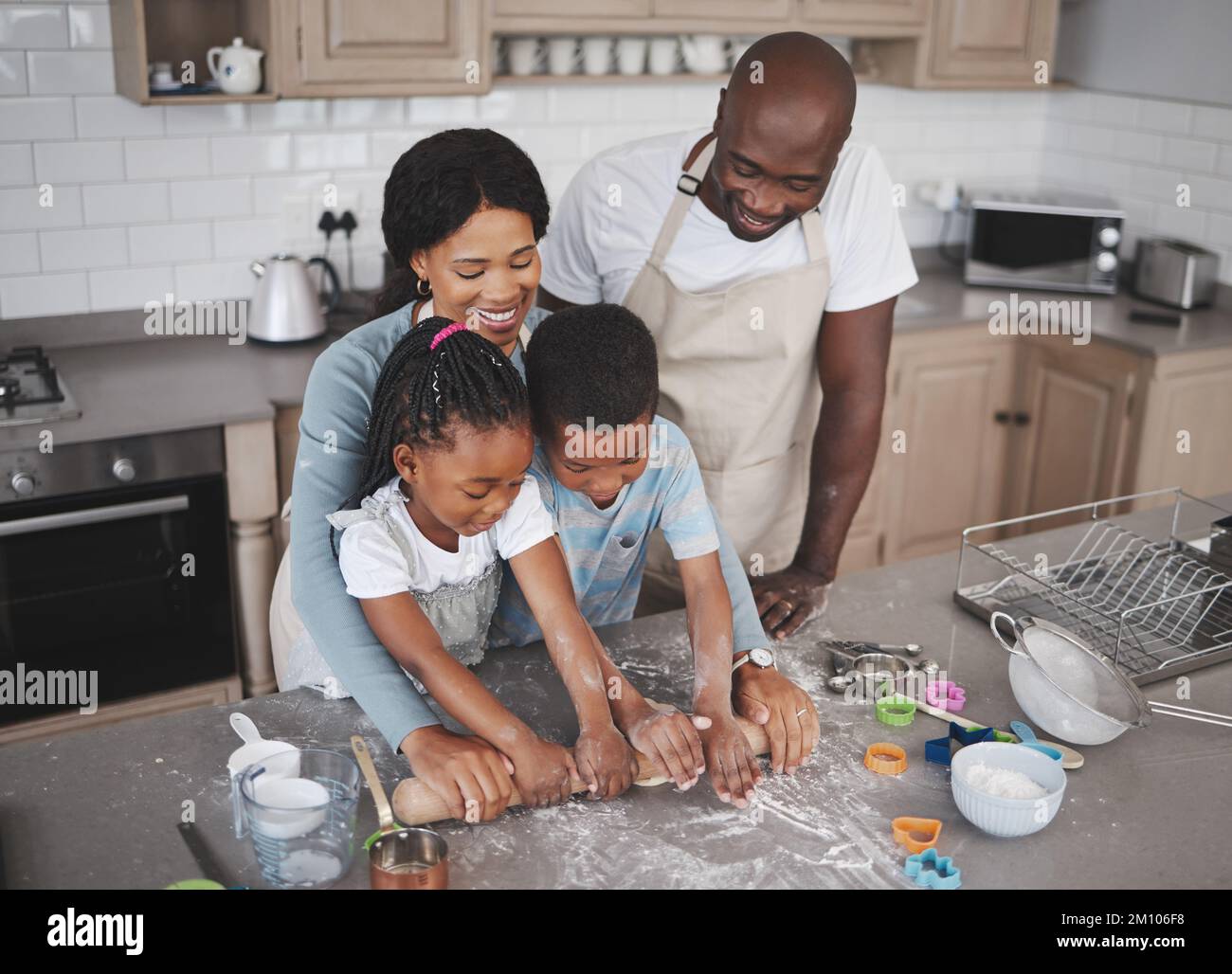 Thats the art of baking. a family baking together in the kitchen Stock ...