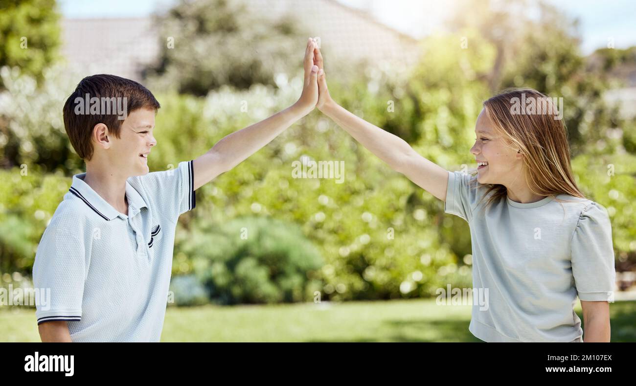 We always have fun together. a young boy and girl giving each other a ...
