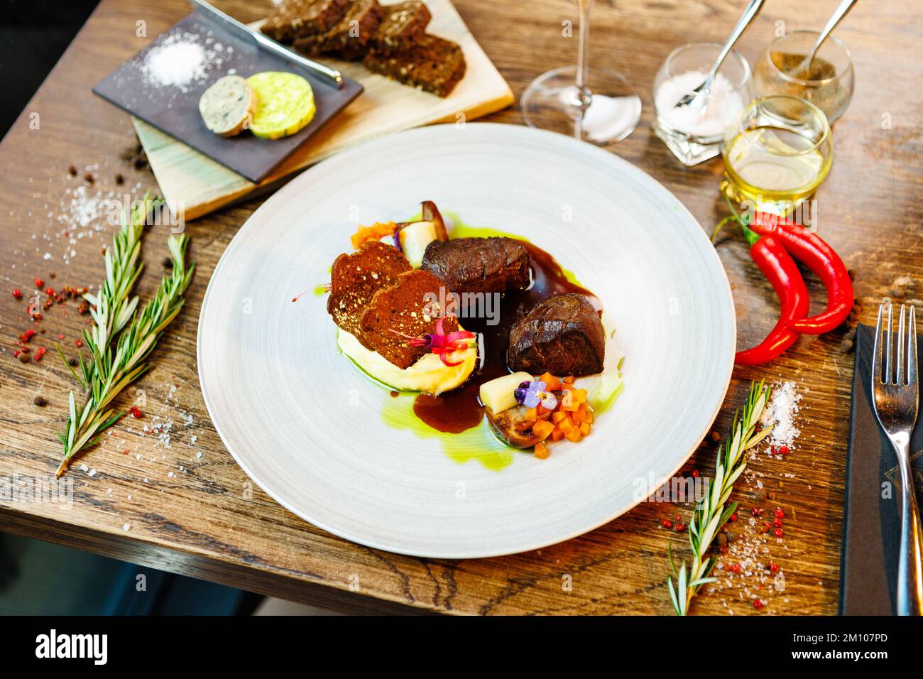 Deer tenderloin. Truffle-potato puree, porcini mushrooms, baked leek ...