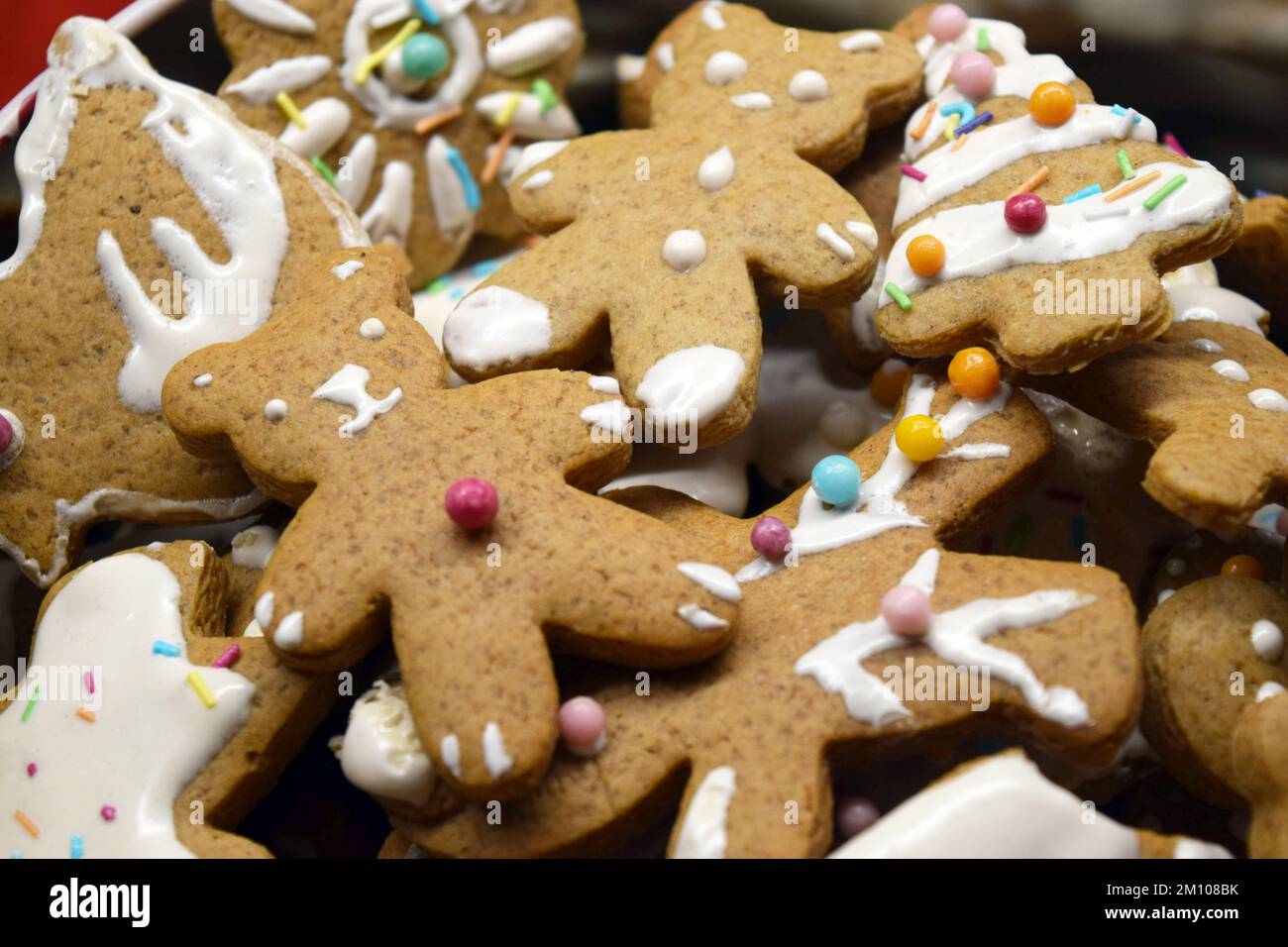 Sweet gingerbread homemade figurines for Christmas decorated with white ...