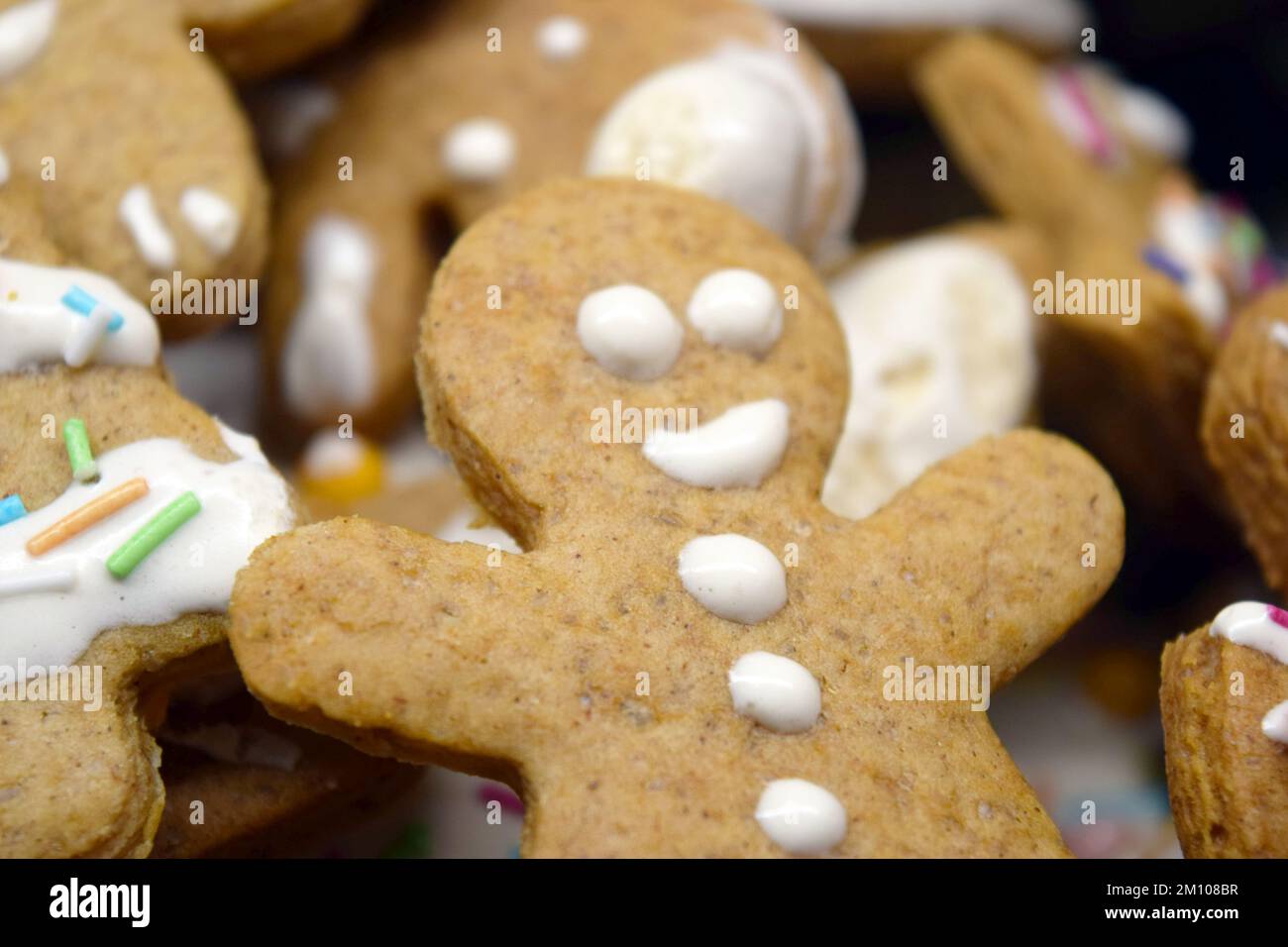 Sweet gingerbread homemade figurines for Christmas decorated with white ...