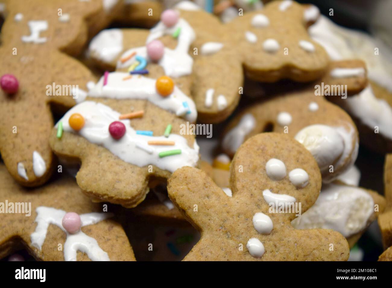 Sweet gingerbread homemade figurines for Christmas decorated with white ...