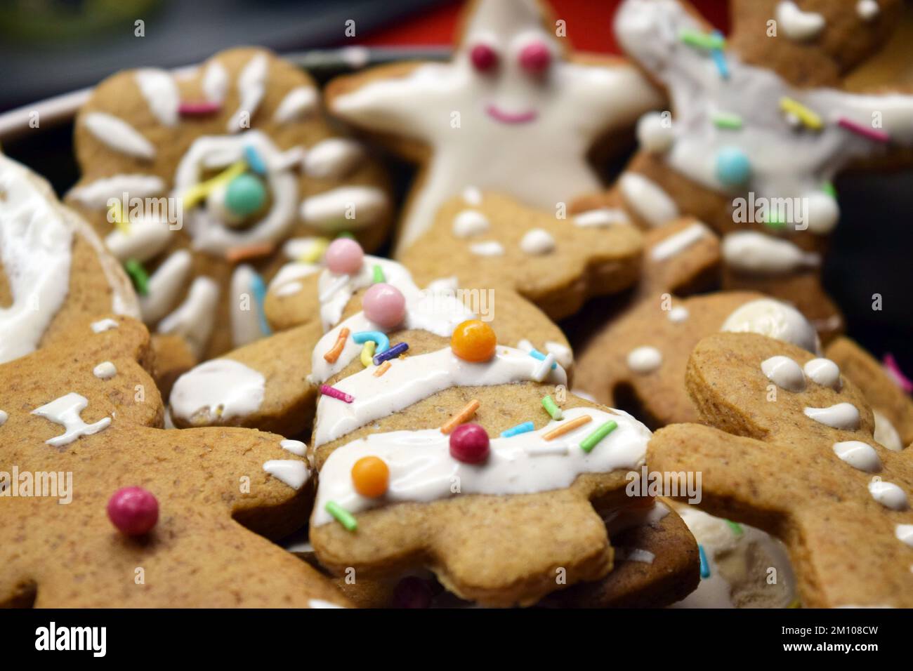 Sweet gingerbread homemade figurines for Christmas decorated with white ...