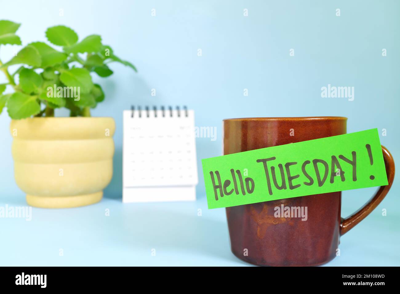 Welcome, hello and happy Tuesday concept. Selective focus of coffee cup ...