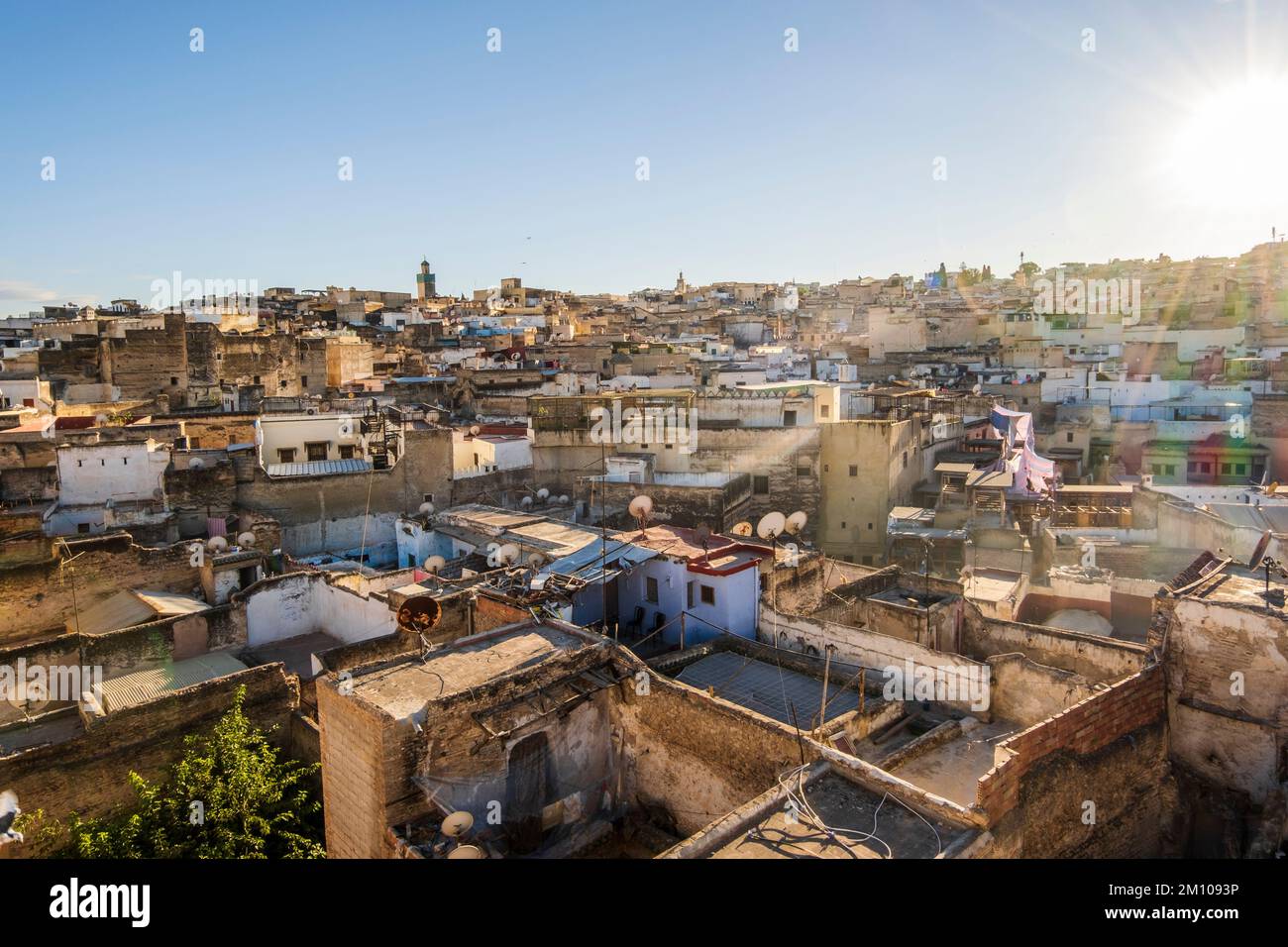 Aerial panoramic view of historic downtown called medina at sunset, Fez ...