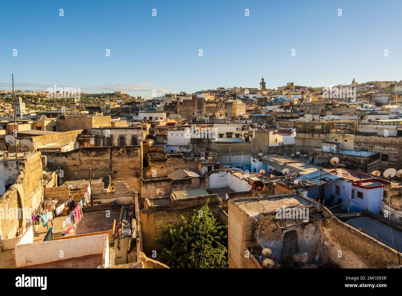 Aerial panoramic view of historic downtown called medina at sunset, Fez ...