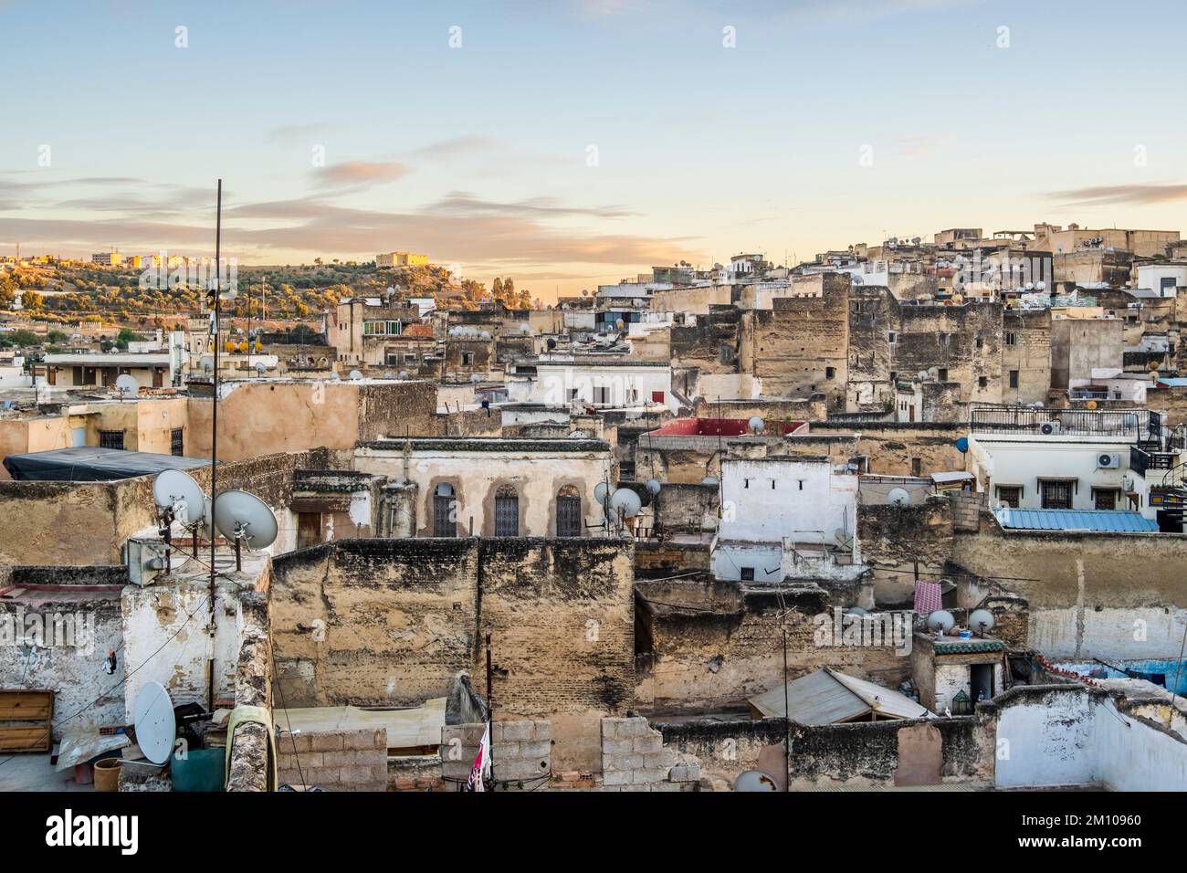 Aerial panoramic view of historic downtown called medina at sunset, Fez ...