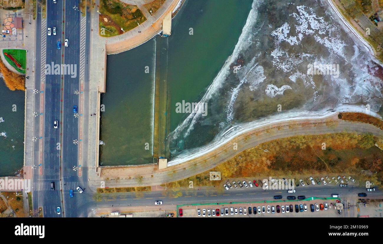 Aerial photo shows the frozen Kongque River in Korla City, northwest ...