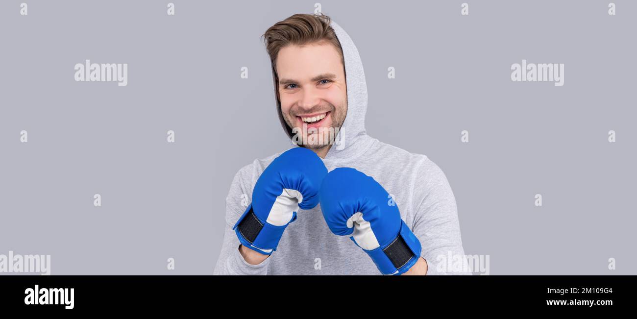 Happy boxer man wearing boxing gloves. Boxing combat sport. Boxing ...