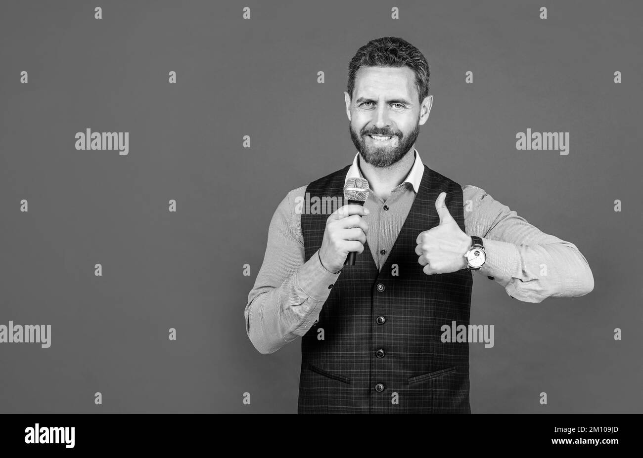 Happy man karaoke singer vocalist with mic show thumbs up red ...