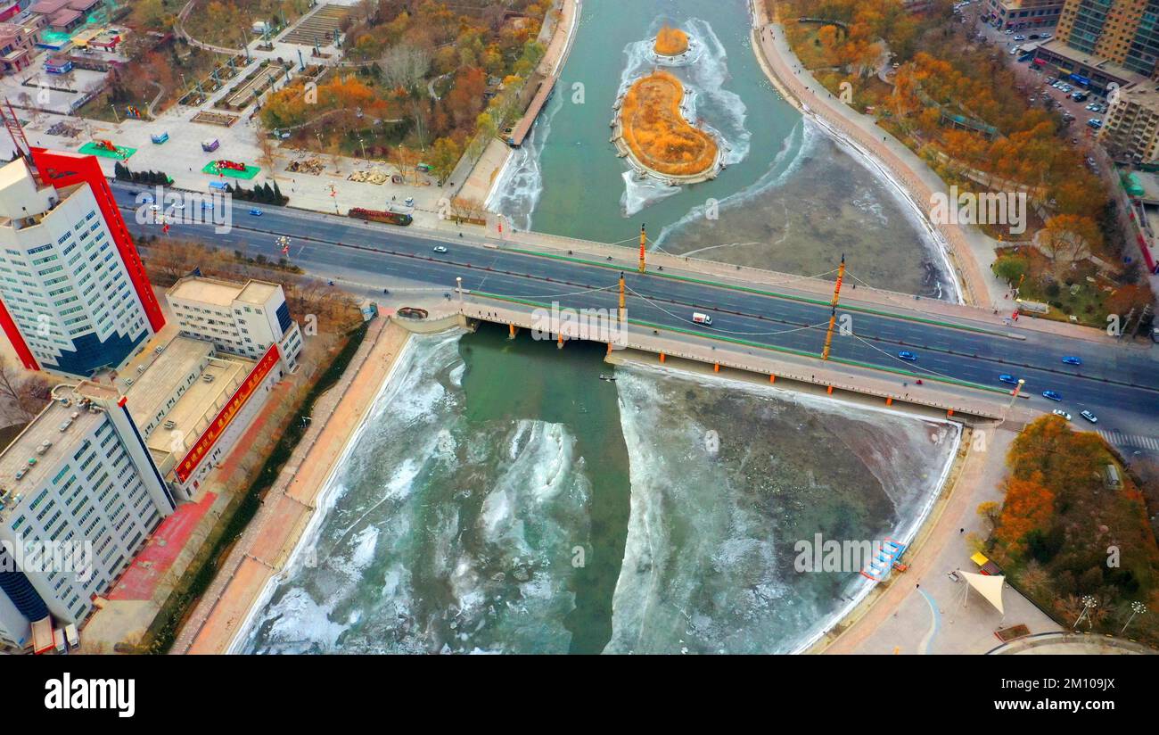 Aerial photo shows the frozen Kongque River in Korla City, northwest ...