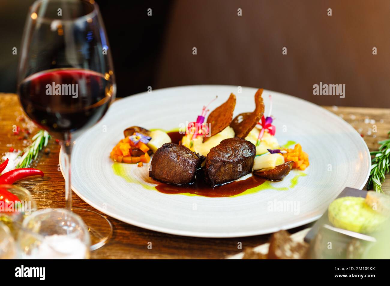 Deer tenderloin. Truffle-potato puree, porcini mushrooms, baked leek ...