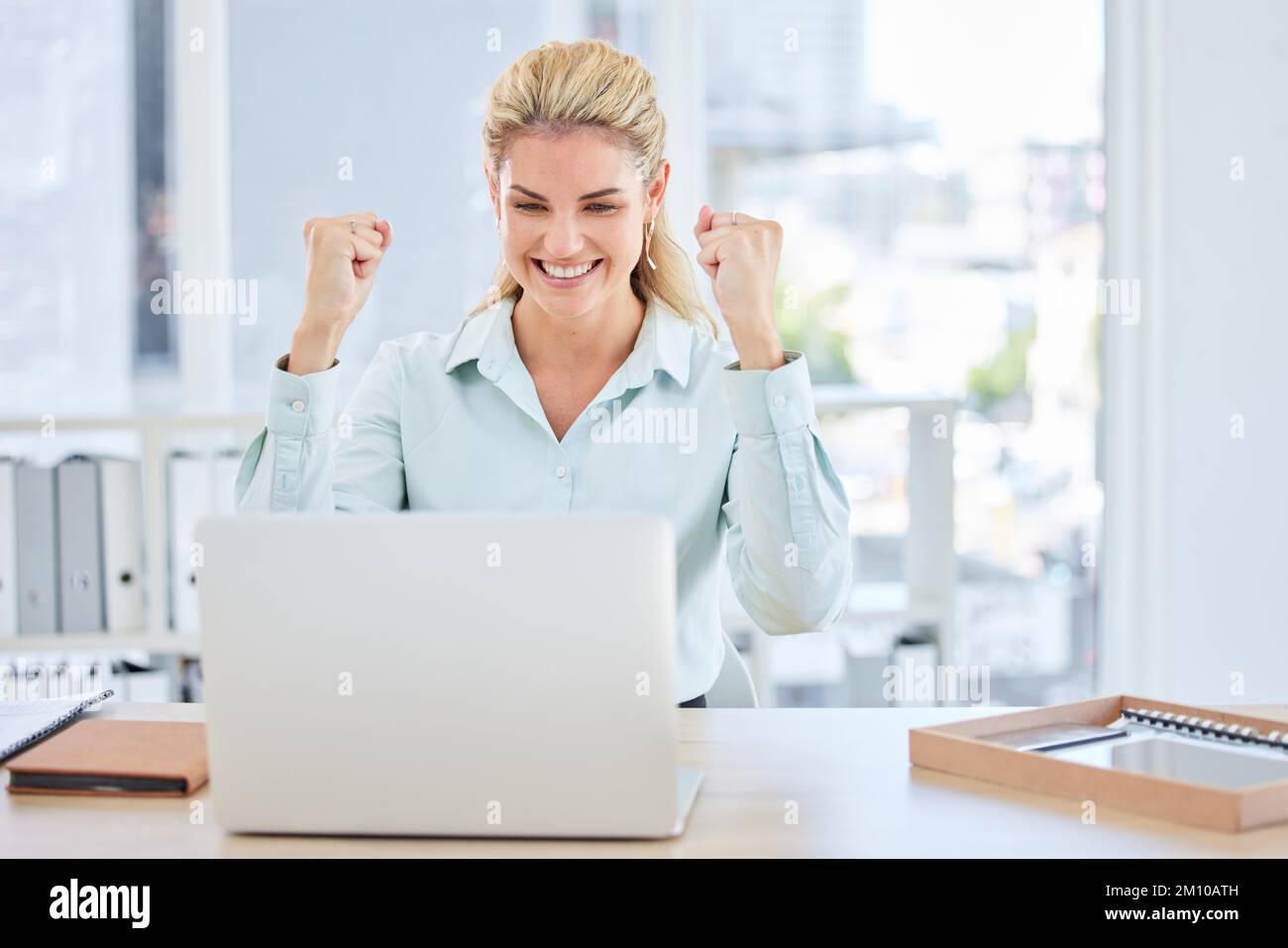 Office, success and woman winner at laptop for attorney career ...