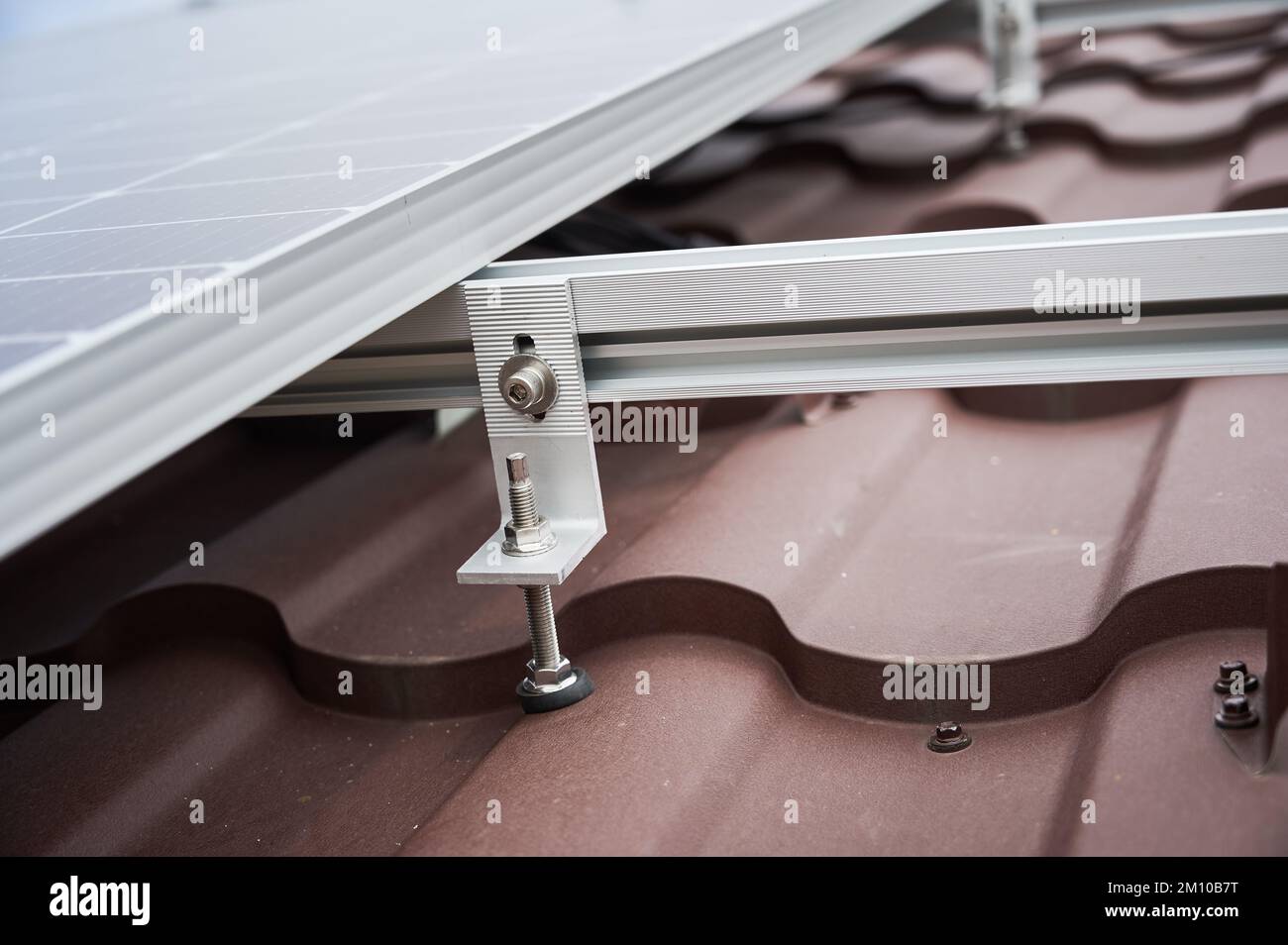 Close up view of mountain clamp of solar photovoltaic panel system on ...