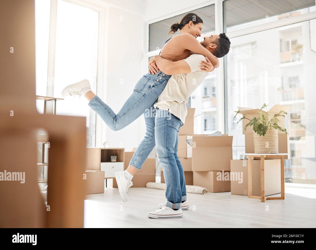 This all feels unreal. a young couple celebrating the move into their ...