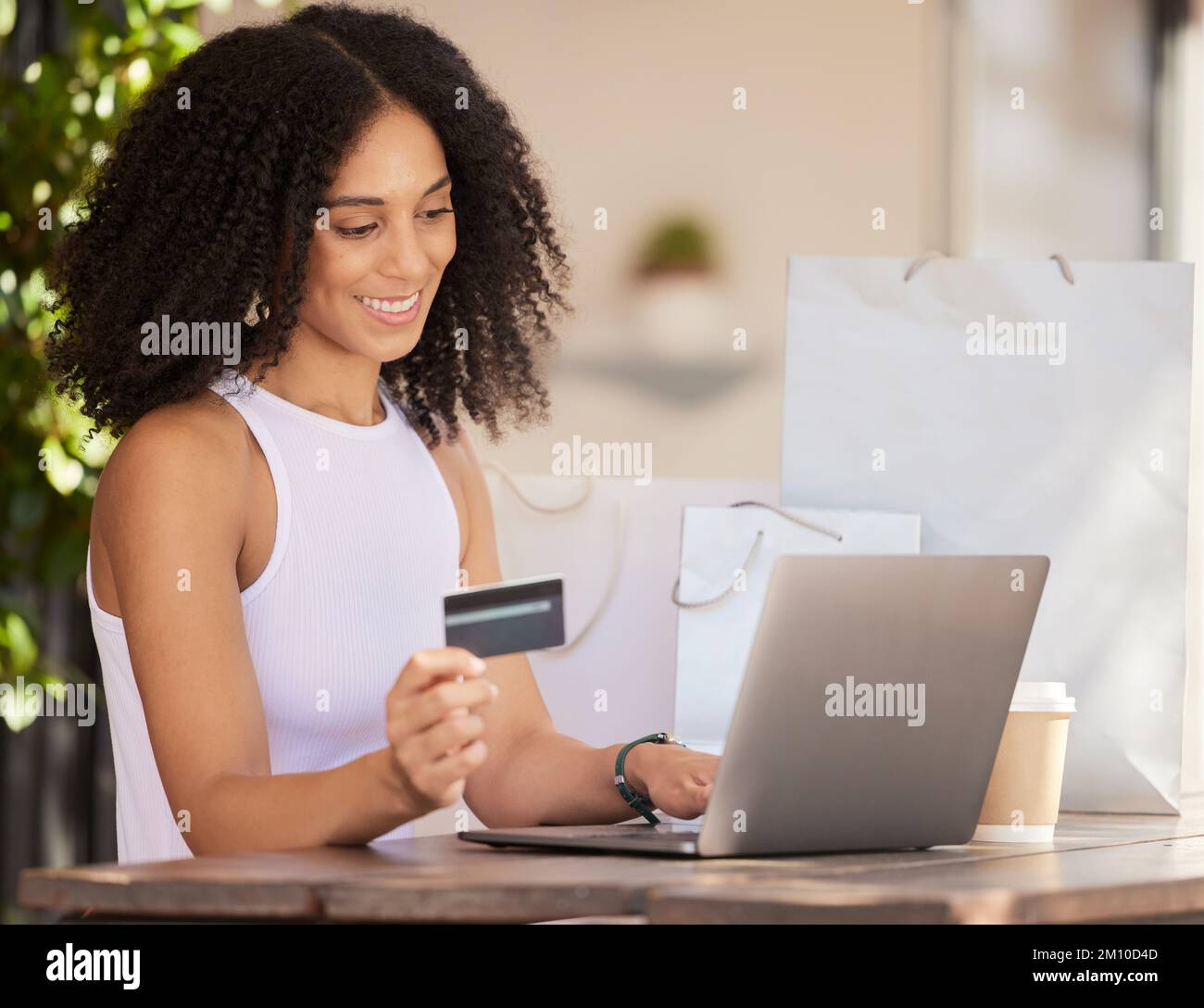 Black woman, laptop and credit card for ecommerce, online shopping and ...