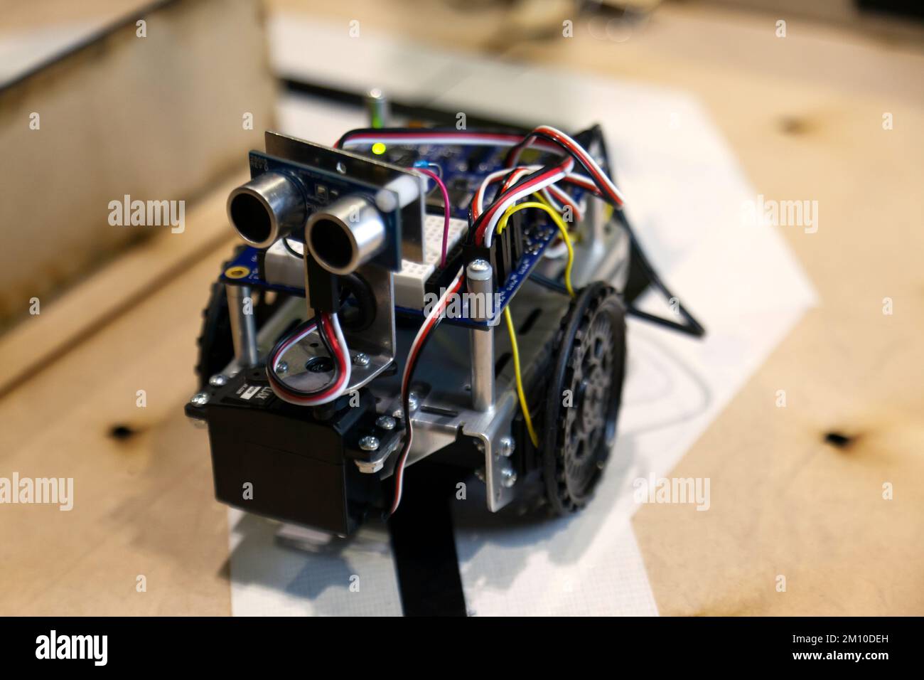 Close-up of a small mobile, semi-autonomous, robotic device on the ...