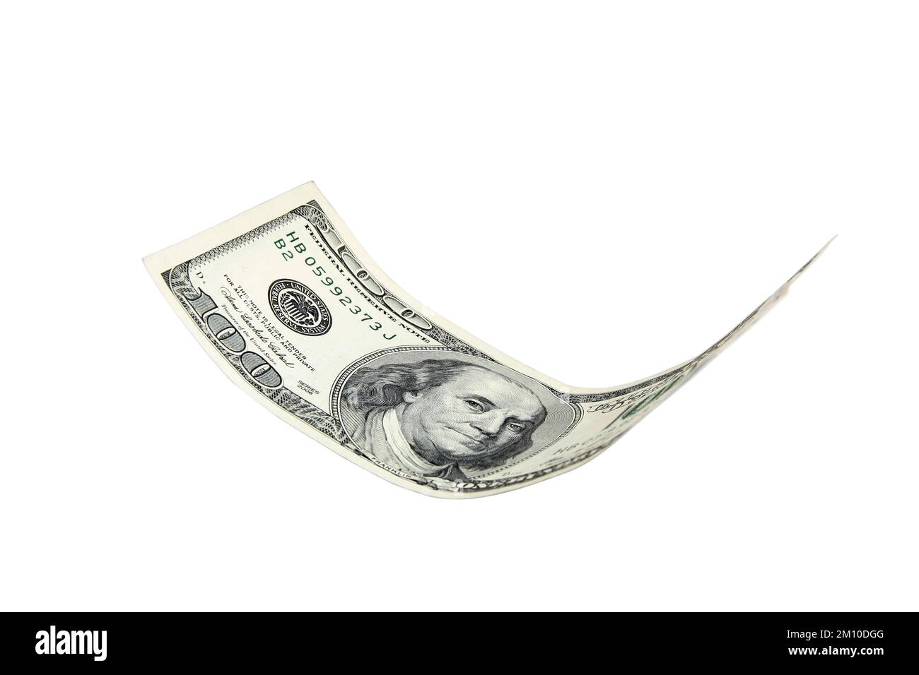 Flying US dollar, isolated, manual focus Stock Photo - Alamy