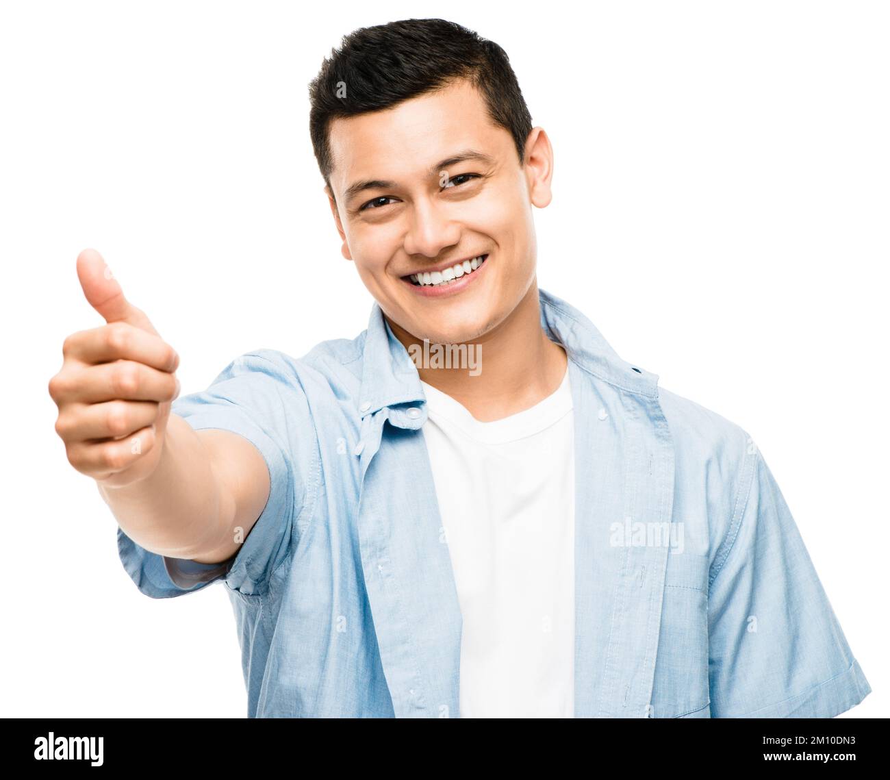 Dont worry be happy. a young man giving the thumbs up against a studio ...
